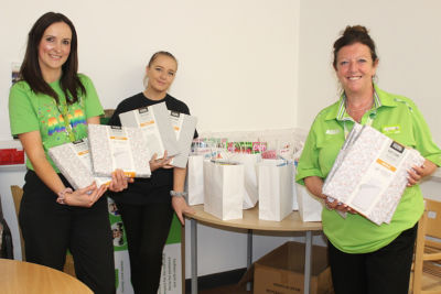 The Johnson F'oldies receive a donation from Asda Bolton, Burnden Park ...